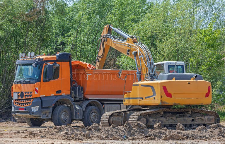 Digger Loading Truck Construction Stock Photo - Image of tracks, serbia ...