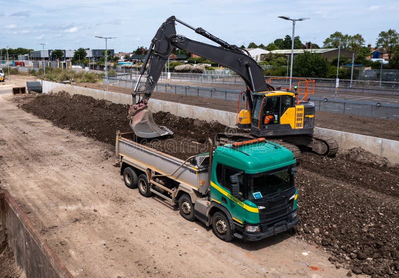 A Digger Loading a Truck with Railway Spoil Stock Photo - Image of ...