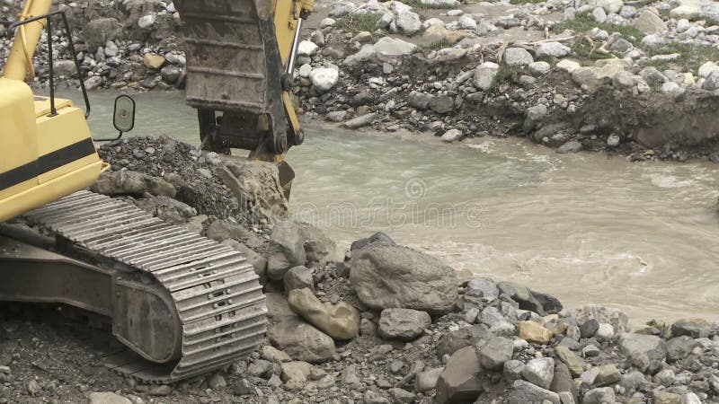 Digger moving rocks stock footage. Video of tractor, backhoe - 42380328