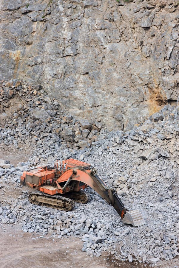 Digger in a quarry stock image. Image of industrial, rock - 15122323