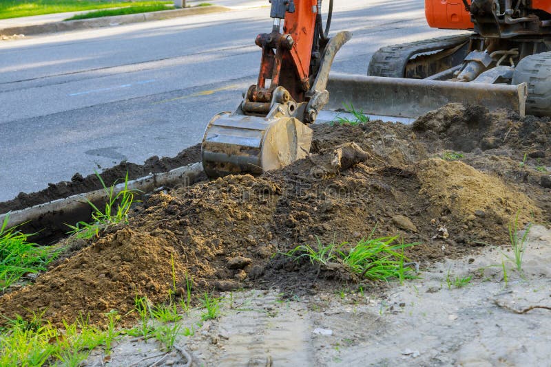 Digger Working at Construction in Excavation Pit Stock Image - Image of ...