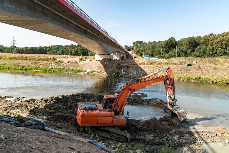 Digger Working on the New Bridge Construction Site Stock Image - Image ...