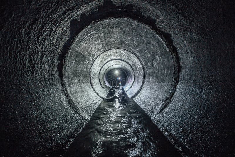 Diggers are Exploring Underground River Flowing in Round Sewer Tunnel ...