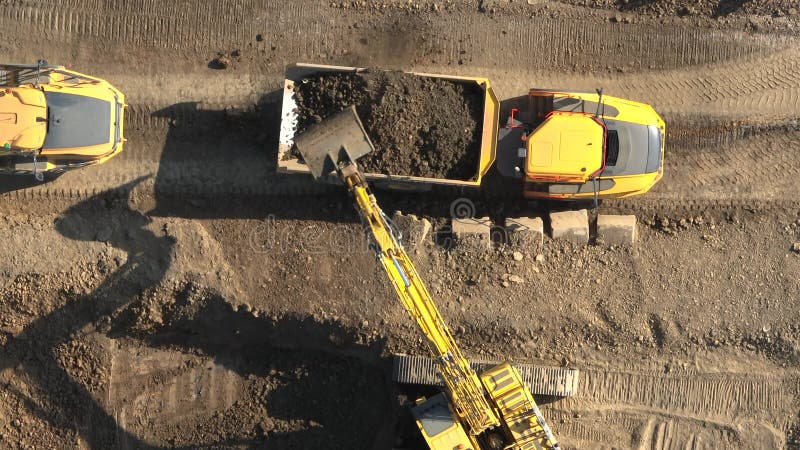 Tipper Truck Being Loaded Up with Earth by a Digger Stock Footage ...