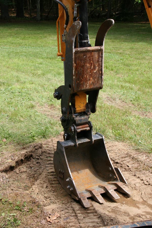 Backhoe Claw bucket stock photo. Image of dump, orange - 34180278