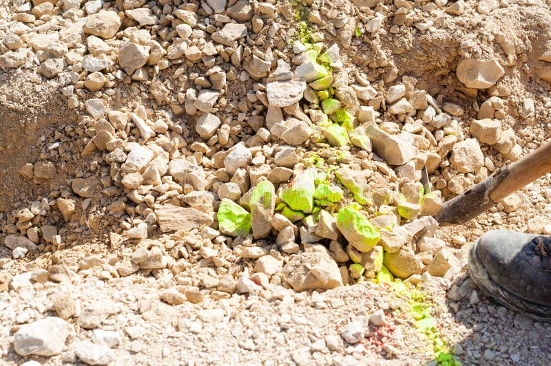 Digging Dig in Crushed Stone on a Construction Site Stock Photo - Image ...