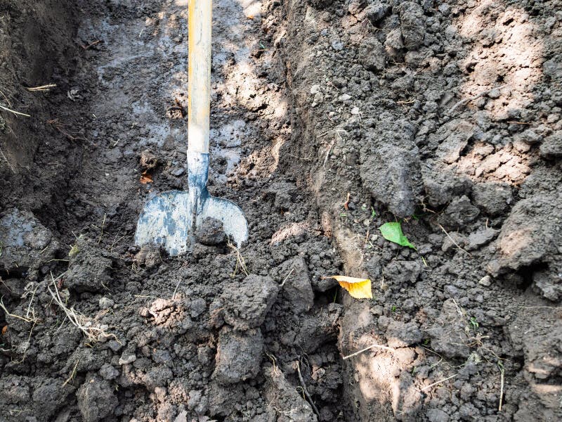 Digging a Ditch with Shovel Stock Image - Image of trench, garden ...