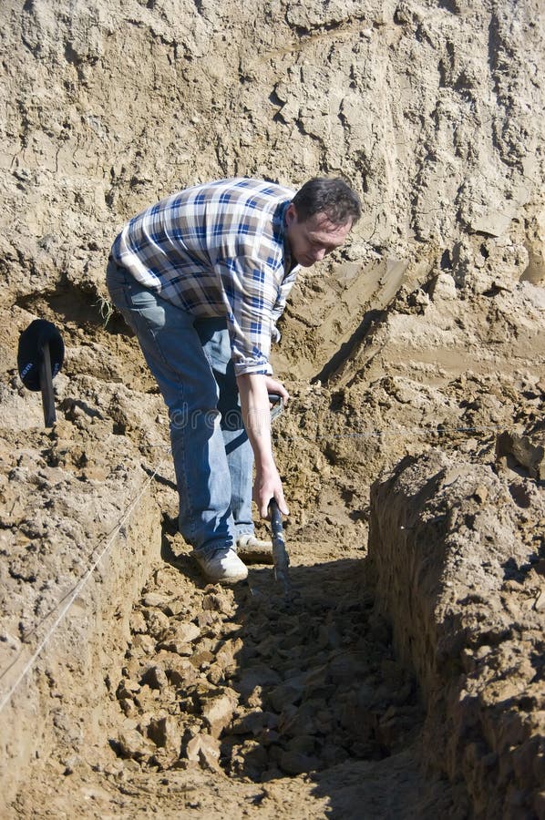Worker Digging in the Ground Stock Image - Image of dirty, stuck: 5018557
