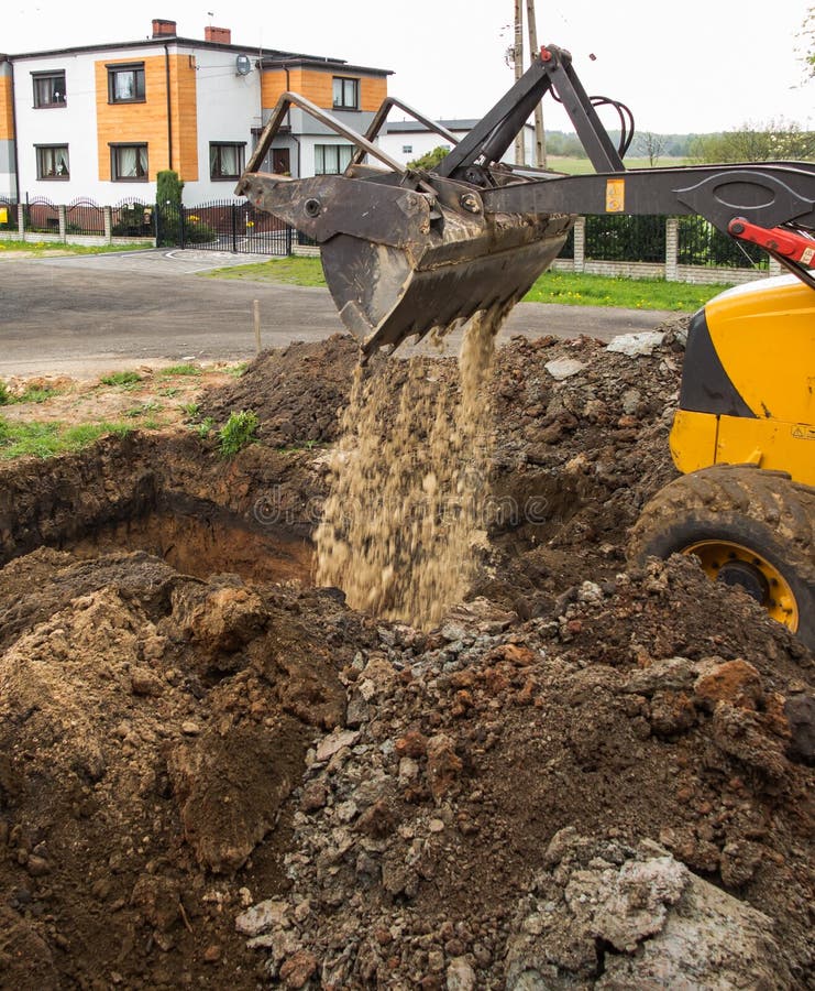 Digging and Leveling the Bottom of the Backyard Septic Tank Stock Image ...
