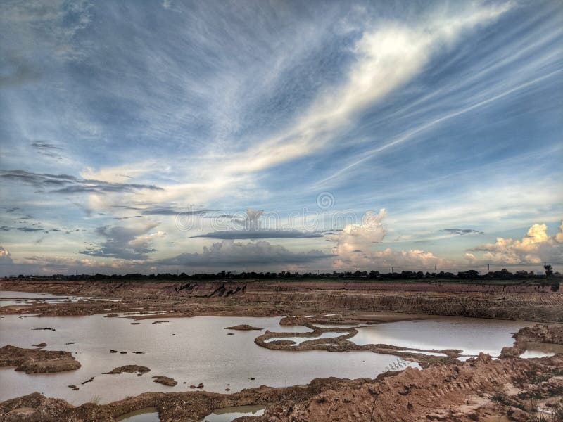 The New Dig stock image. Image of digging, cloud, pond - 119515435