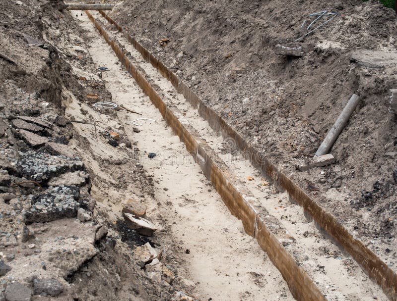 Narrow Trench In Summer Farm Yard Through Grass For Water Pipe Stock ...