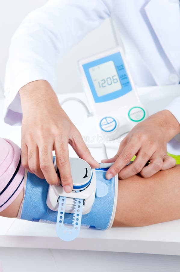 Digital Blood Pressure Monitor Stock Image - Image of cardiology, hands ...
