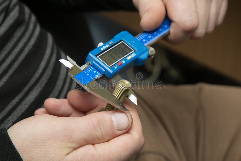 Digital Caliper in the Hands of the Master Stock Image - Image of tool ...
