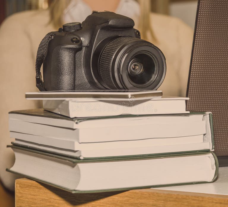 Digital Camera and Books stock photo. Image of library - 91329646