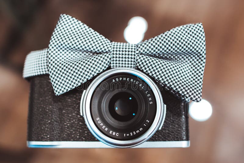 The Digital Camera with a Bow Tie Stock Photo - Image of optical, black ...