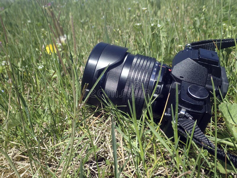 Digital camera on grass stock photo. Image of close, daylight - 52797408