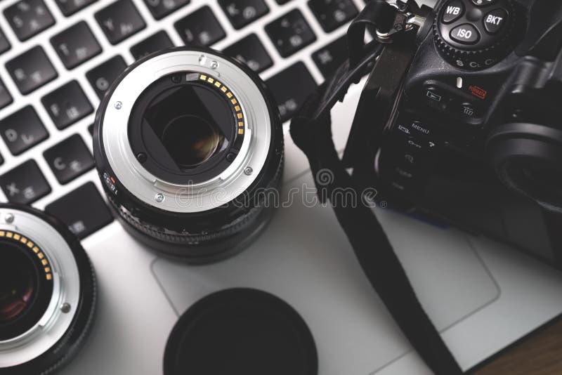 Digital Camera, Lens and Laptop. Concept of Photographer Work Station ...