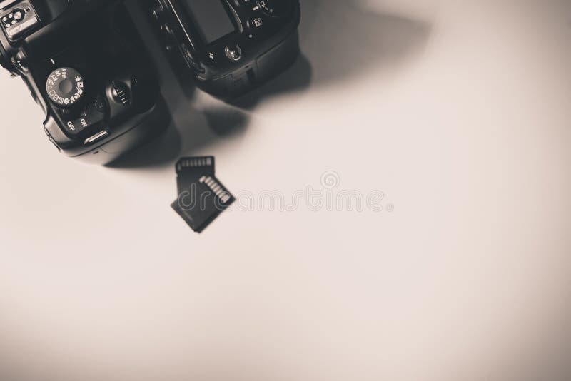 Digital Camera with Memory Card on Table Preparing To Transfer Photos ...