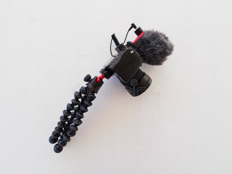 Digital Camera with Microphone and Tripod on White. Vlogging Concept ...