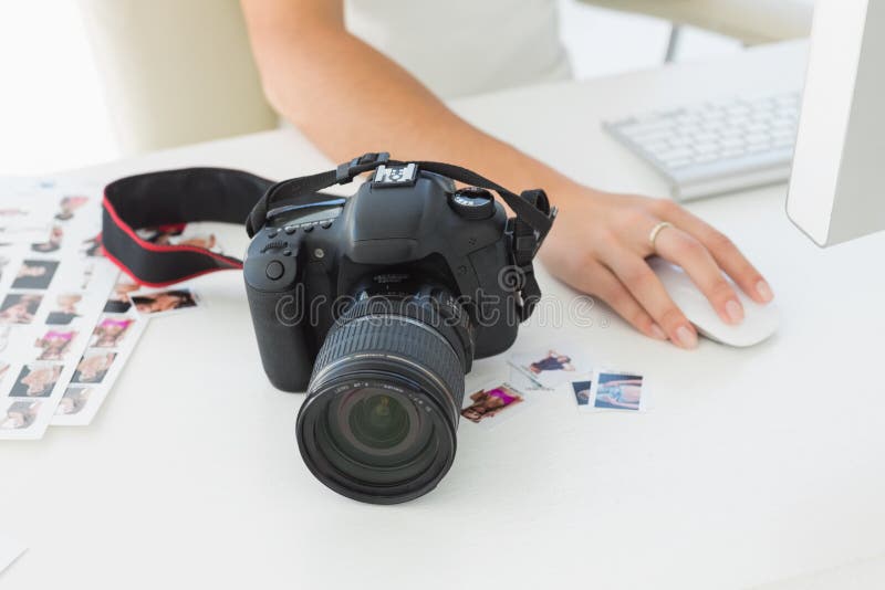 Digital Camera on Photographers Desk Stock Photo - Image of working ...