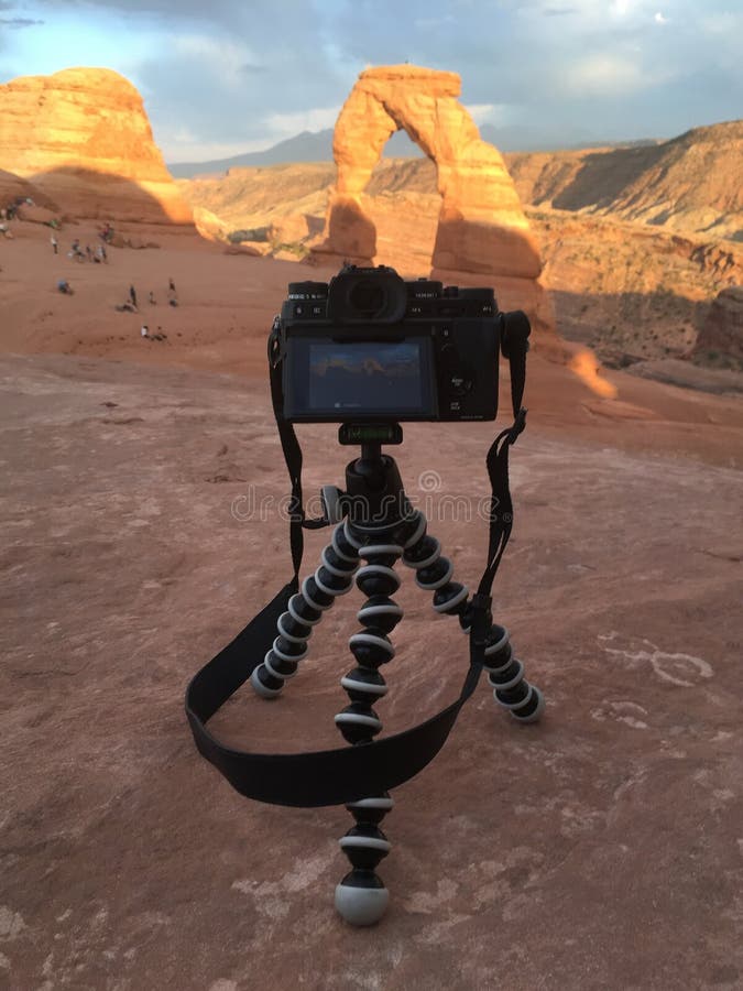 Digital Camera on a Travel Tripod in Front of Delicate Arch, Arches ...