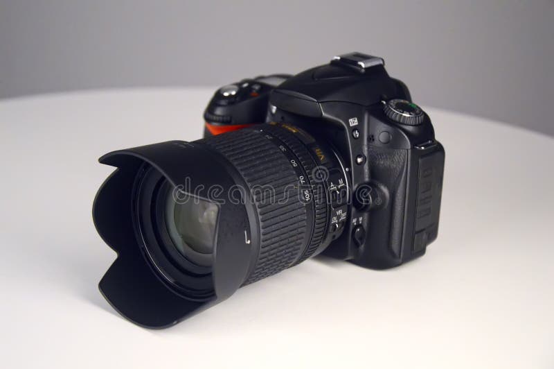 Digital camera on a table stock photo. Image of lenses - 52276824