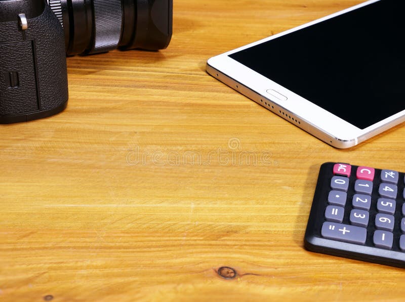 A Camera, a Smartphone/tablet and a Calculator Stock Photo - Image of ...