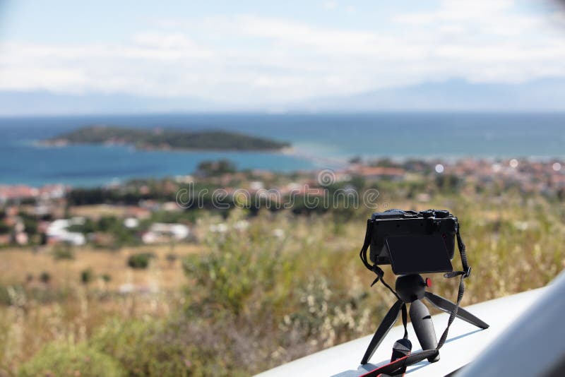 Digital Camera on Camera Tripod Taking a Photo of Panoramic Landscape ...