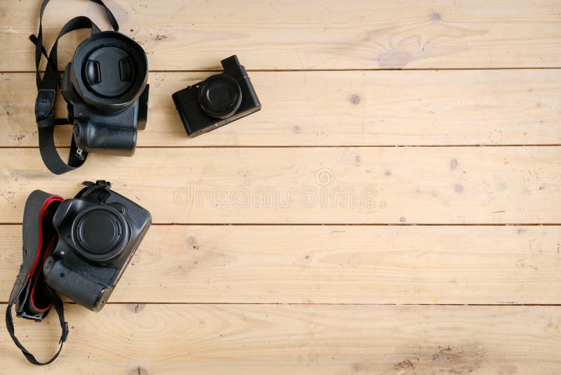 Digital Cameras on the Wooden Table Stock Image - Image of texture ...