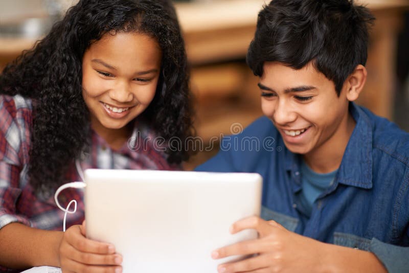 Digital Classroom Classmates. Two Young Teenagers Using a Digital ...