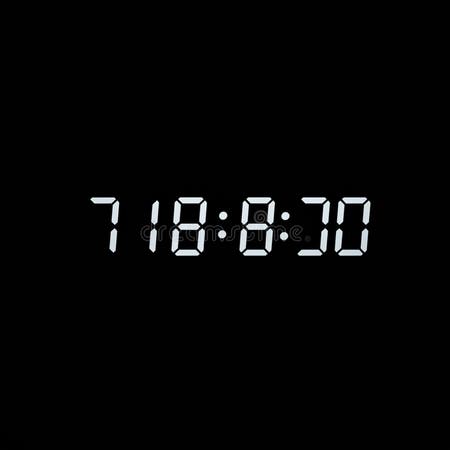 Digital Clock on a Black Background Displaying Two Sequences of Numbers ...