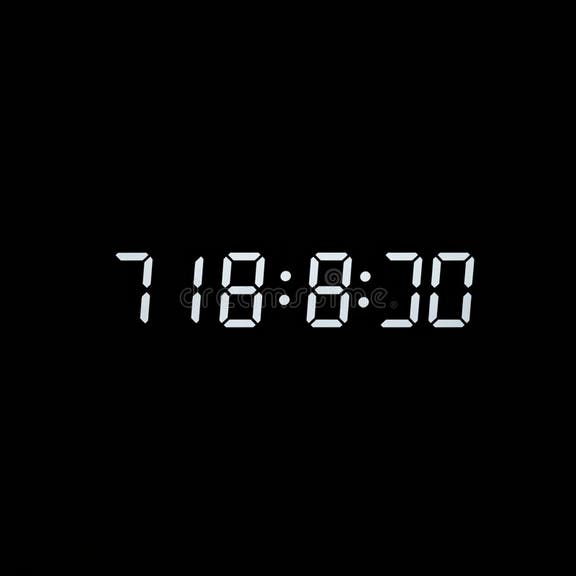 Digital Clock on a Black Background Displaying Two Sequences of Numbers ...