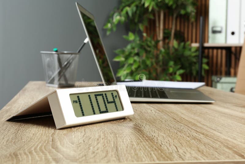 Digital Clock on Table in Office, Space for Text Stock Photo - Image of ...