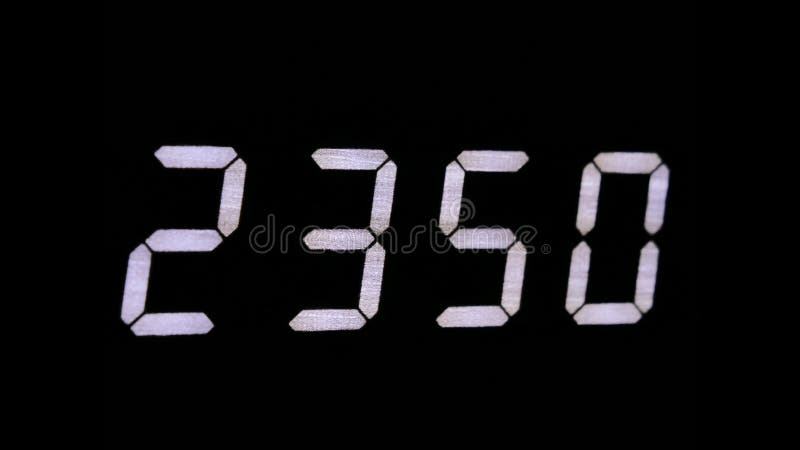 Digital Clock Displaying the Word Spring on Black Stock Footage - Video ...
