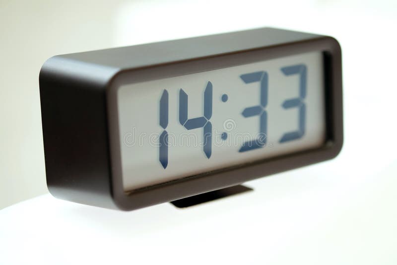 Digital Clock on White Table Stock Image - Image of modern, number ...