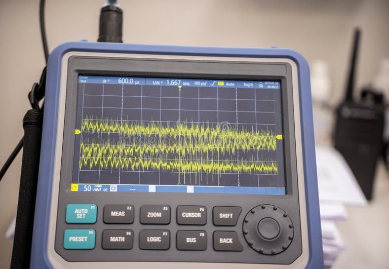 Digital Close-up Image of an Oscilloscope Screen Displaying Real-time ...