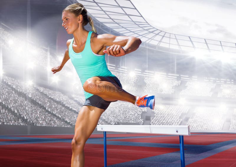 Female Athlete Jumping Over Hurdle on Race Track Stock Image - Image of ...