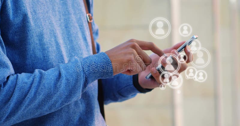 Digital Composite of Man in Blue Sweatshirt Using a Mobile Phone Stock ...