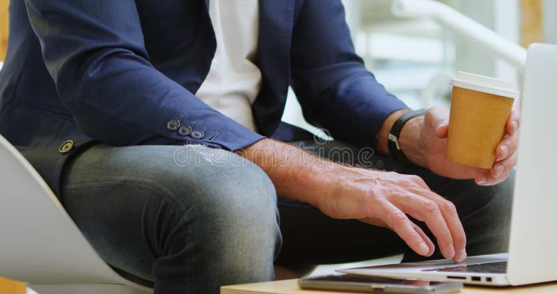 Digital Composite of a Man Checking His Emails while Drinking Coffee ...