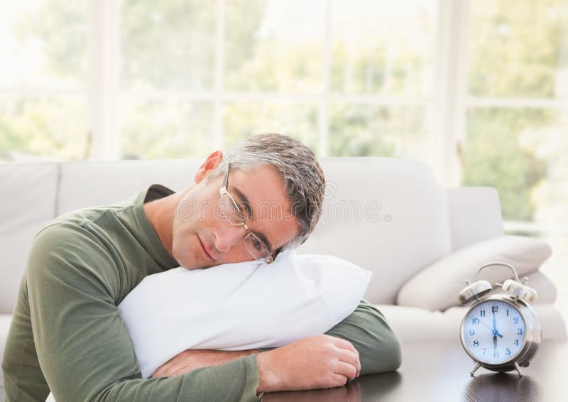 Man Tired by Clock in Front of Windows Stock Photo - Image of hair ...