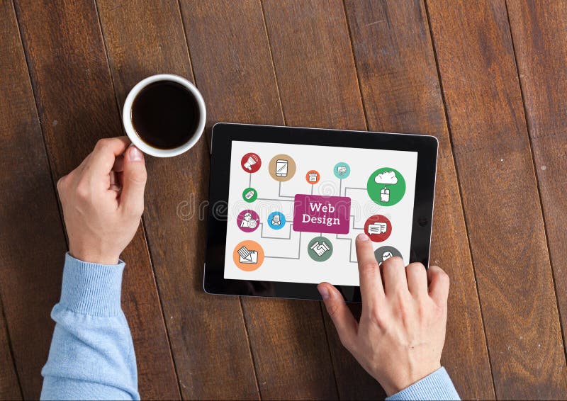 Table Top with a Tablet with Web Graphics on the Screen Stock Photo ...