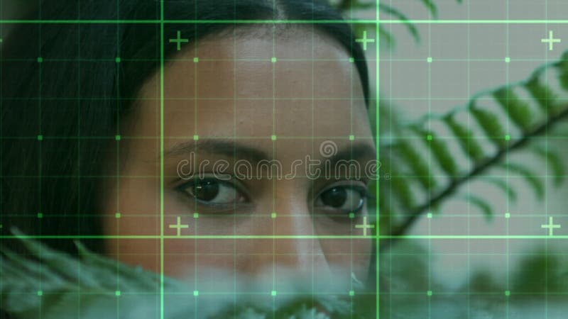 Digital Composition of Grid Network Against Close Up of Eyes of a Woman ...