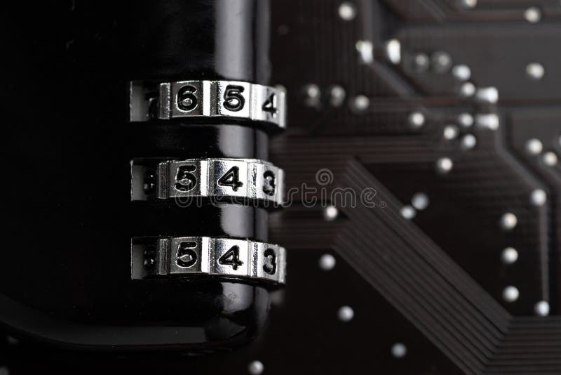 Digital Cyber Safety Or Security Concept Code Numbers On Combination Lock On Computer Circuit