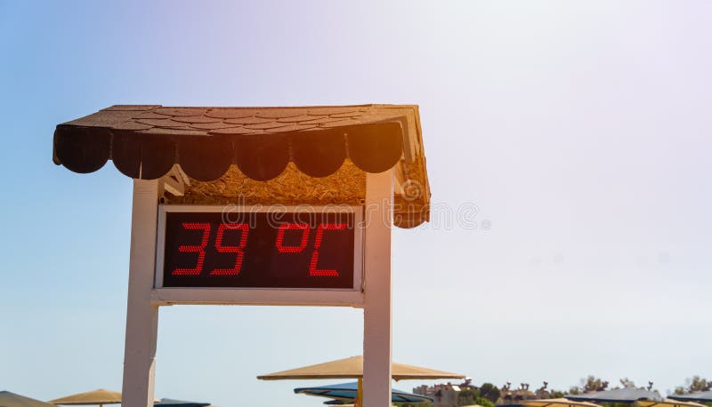 Digital Degrees Showing Air Temperature by the Sea Stock Photo - Image ...