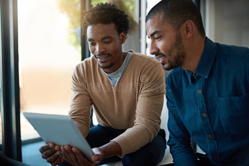 Digital Discussions in Action. Colleagues Working Together on a Digital ...