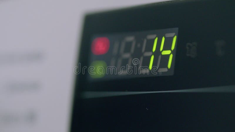The Digital Display Timer on Your Washing Machine Shows the Progress of ...