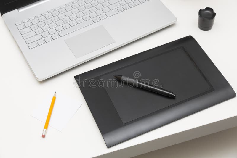 Digital Drawing Tablet and Laptop on the Table Stock Illustration ...