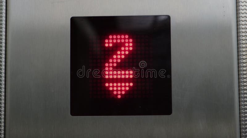 Digital Elevator Display Indicating Movement from Fourth To First Floor ...