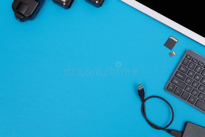 Digital Gadgets on Blue Table Stock Image - Image of items, tablet ...