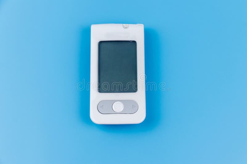 Digital Glucometer on Pastel Blue Background. Diabetes Concept Stock ...